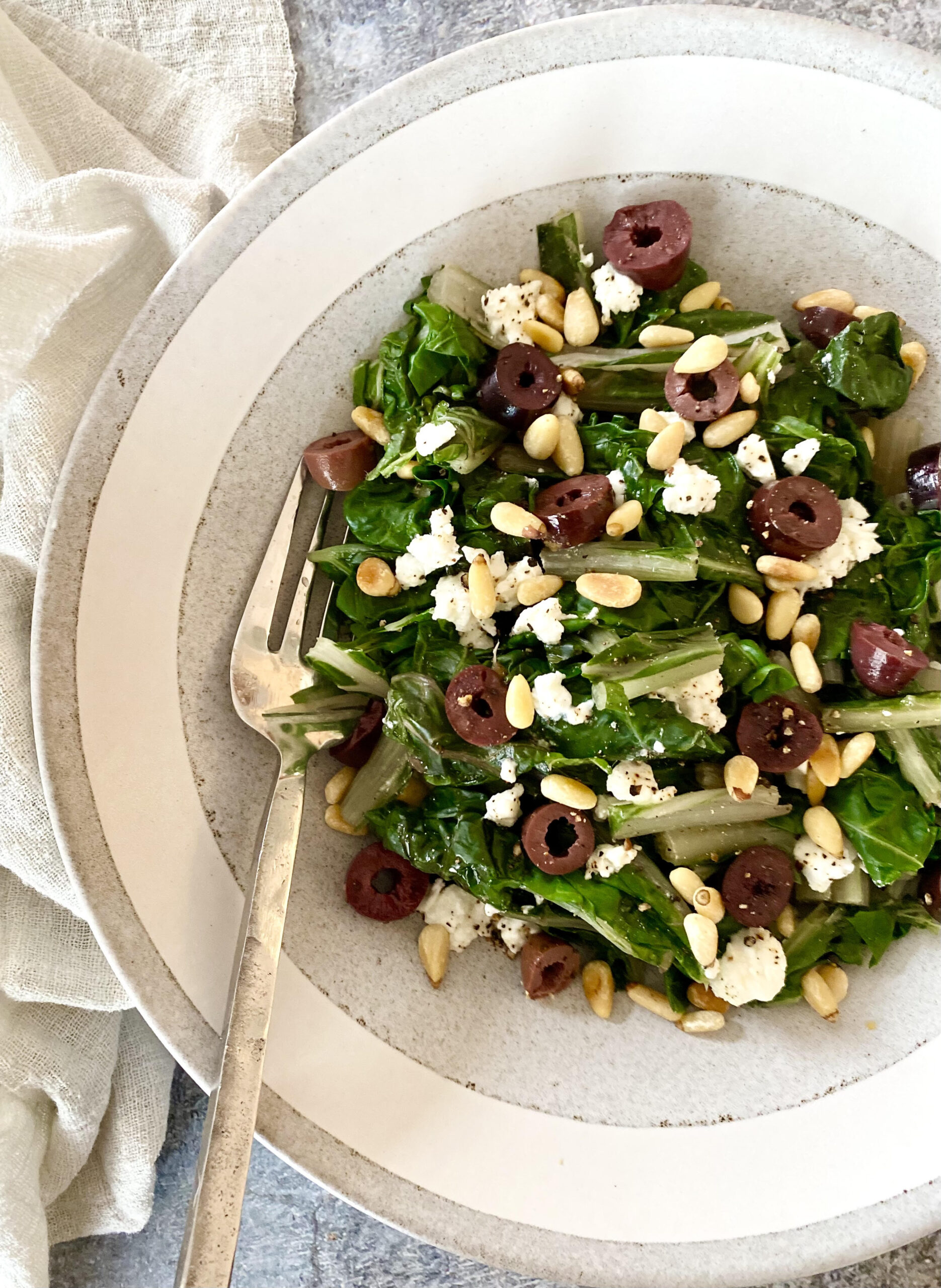 Swiss Chard with Feta, Olives, and Pine Nuts - Sacha Served What